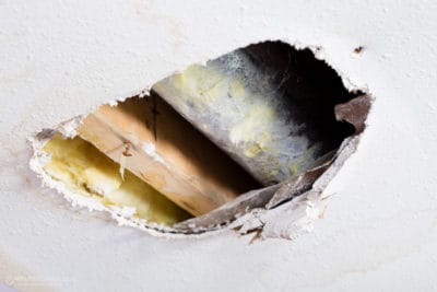 How A Crowded Cupboard Destroyed Our Basement Ceiling - 5 Minutes for Mom